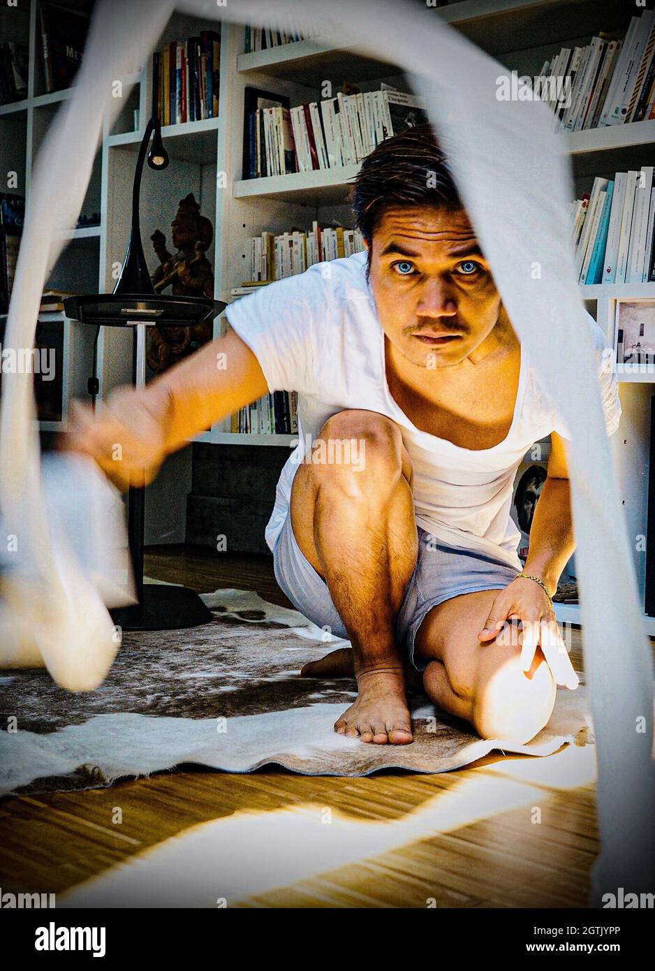 Portrait Of Young Man Standing At Home Stock Photo - Alamy