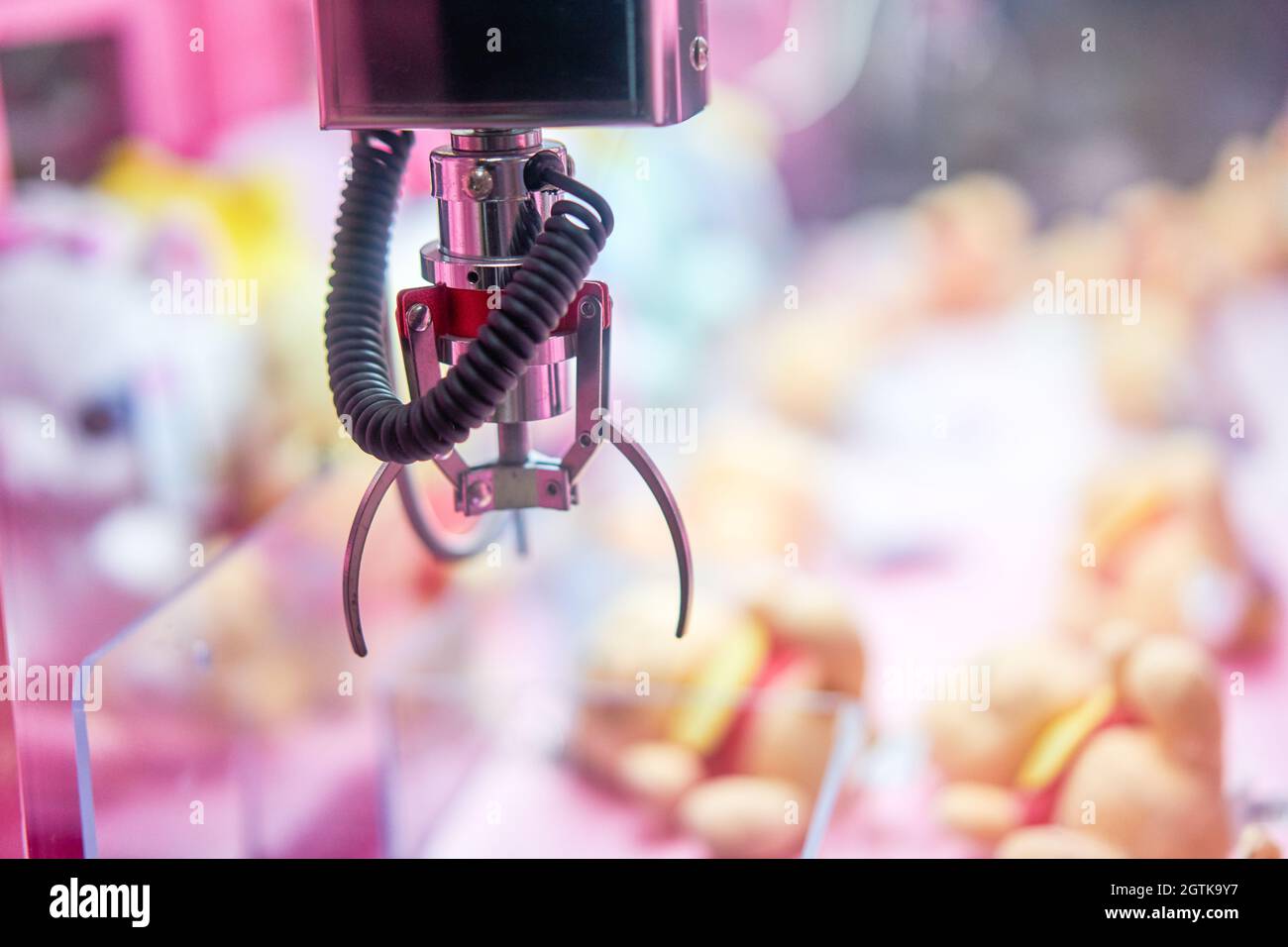Claw machine doll hi-res stock photography and images - Alamy