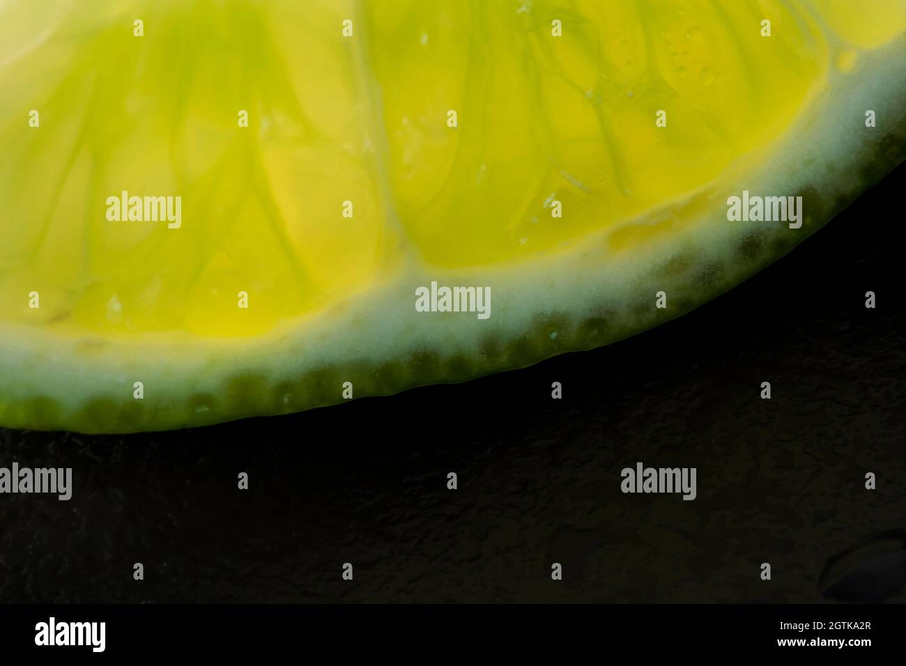 Macro fruit: Ripe lime slice extreme close-up with black background, horizontal format Stock ...