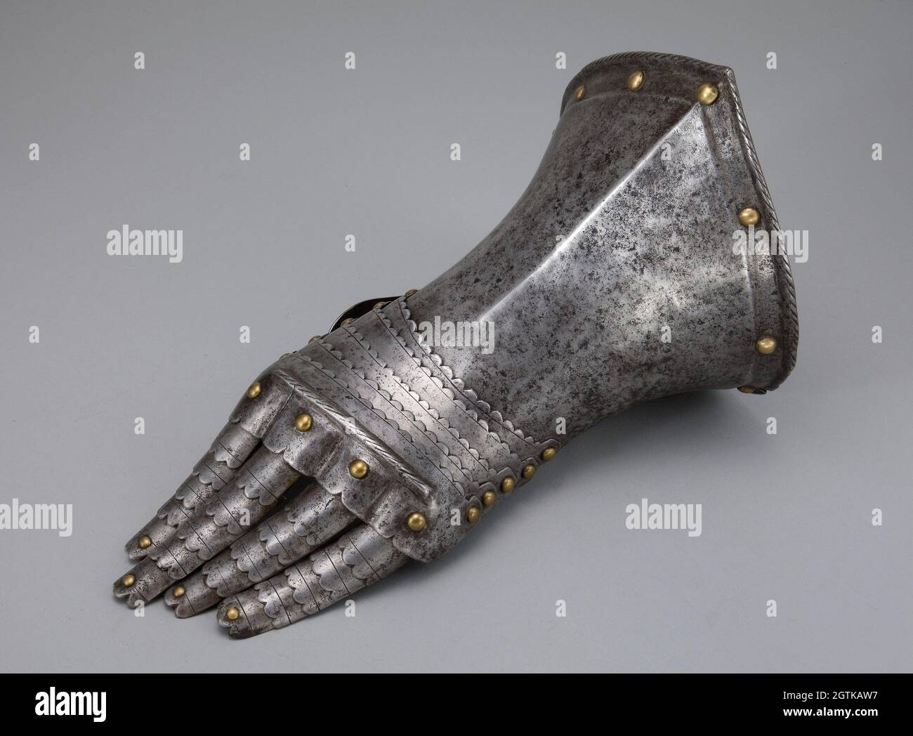 Vertical shot of fingered gauntlet for the left hand, arms and armor on ...