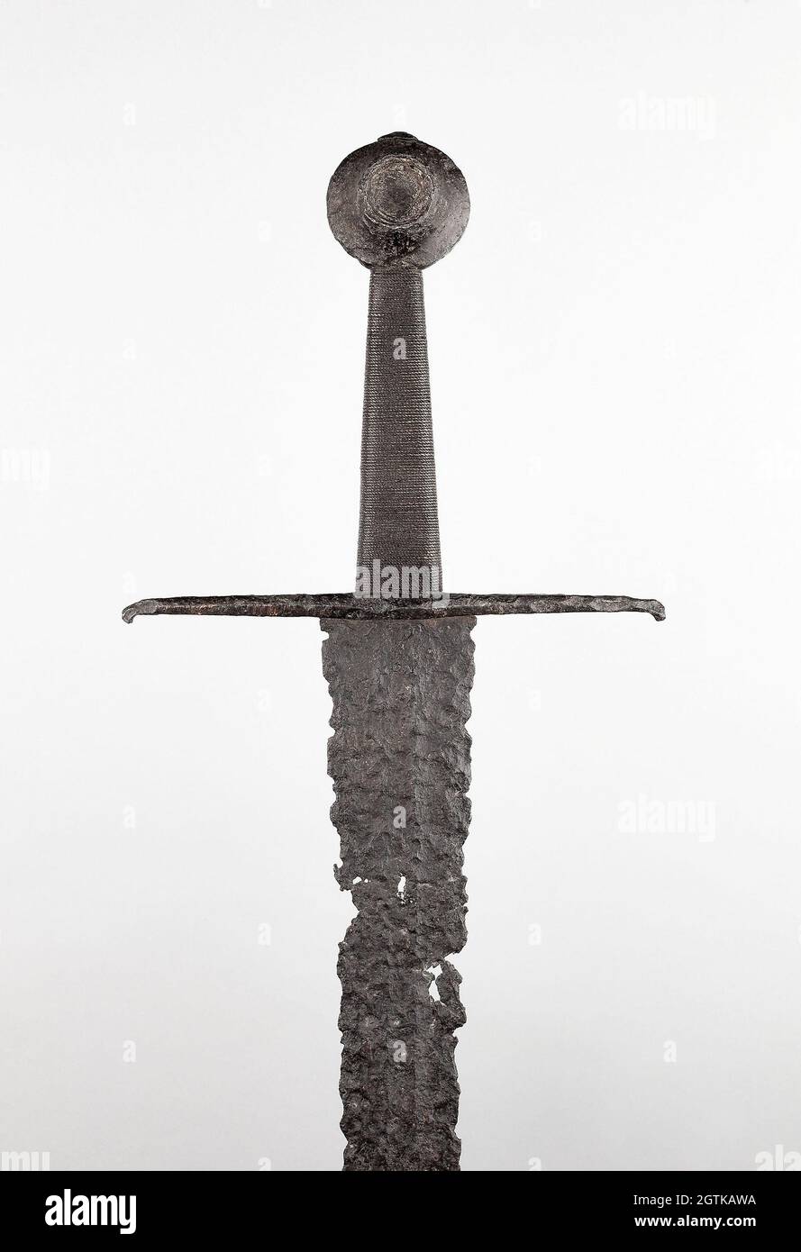 Vertical shot of sword, arms and armor on white background Stock Photo ...