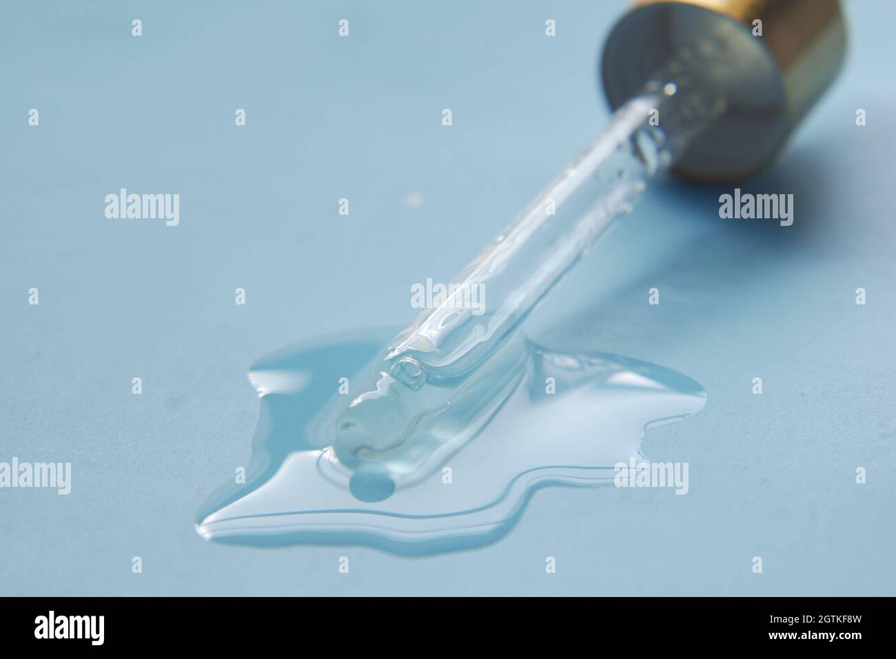 Drop falls from a pipette on flat surface Stock Photo - Alamy