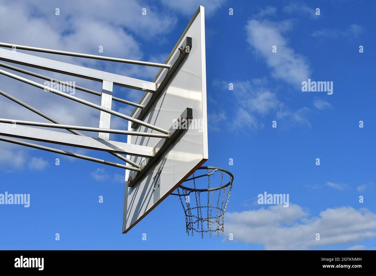 Basketball, Defenders Hoop On A Field With Blue Sky Stock Photo - Alamy