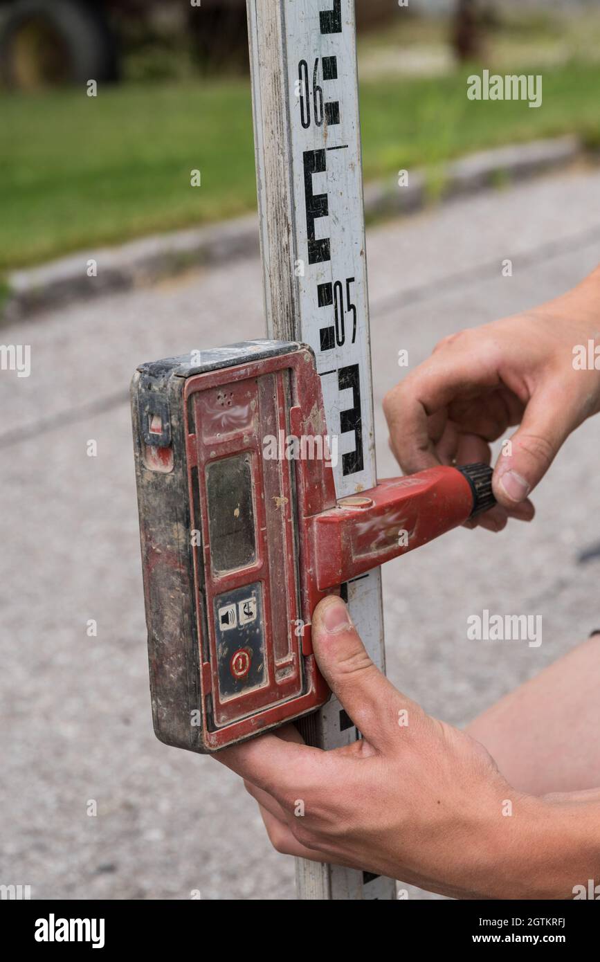 Measurement Technology For Measuring A Property - Construction Workers ...
