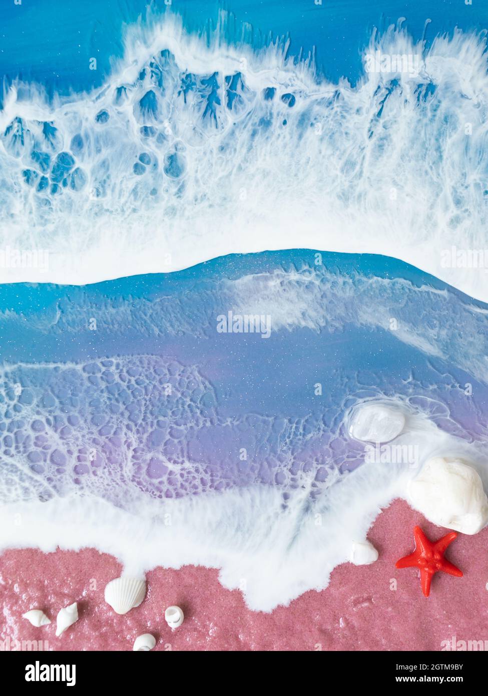 Resin art with sea waves and beach with starfish. Epoxy resin art ...