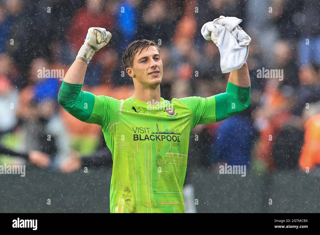 Stuart Moore #13 of Blackpool celebrates with the fans as Blackpool win ...