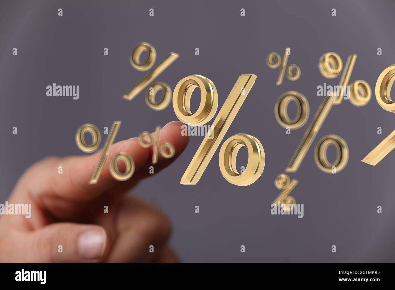 Person presenting 3D rendered percent icon representing the concept of ...