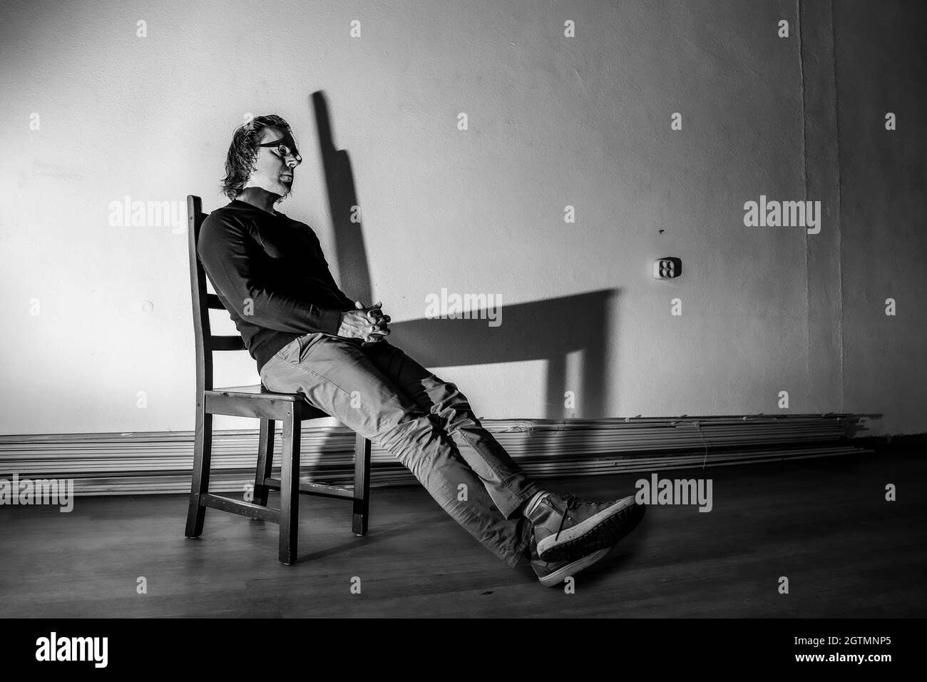 Shadow on chair Black and White Stock Photos & Images - Alamy