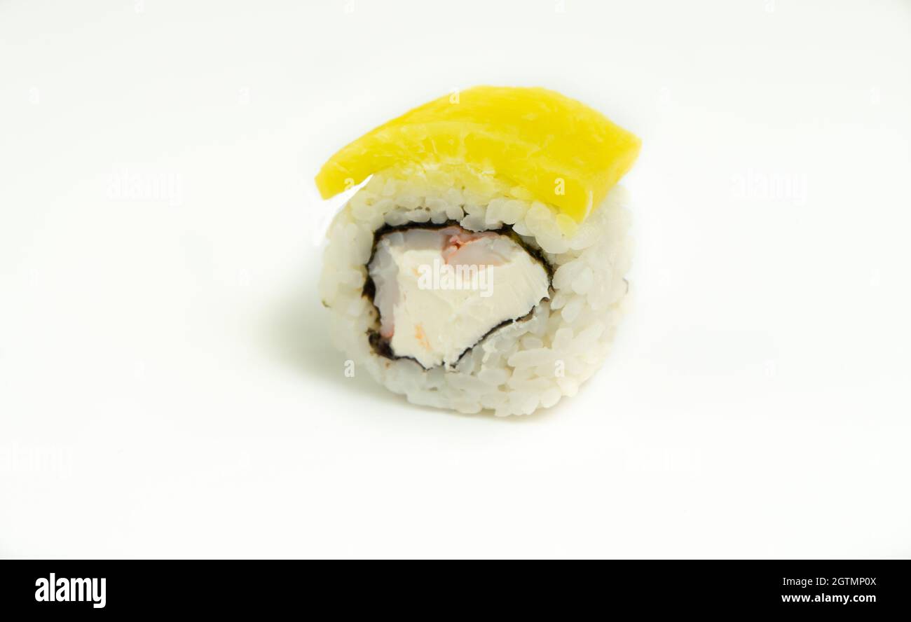 traditional fresh japanese sushi rolls with daikon radish on white ...