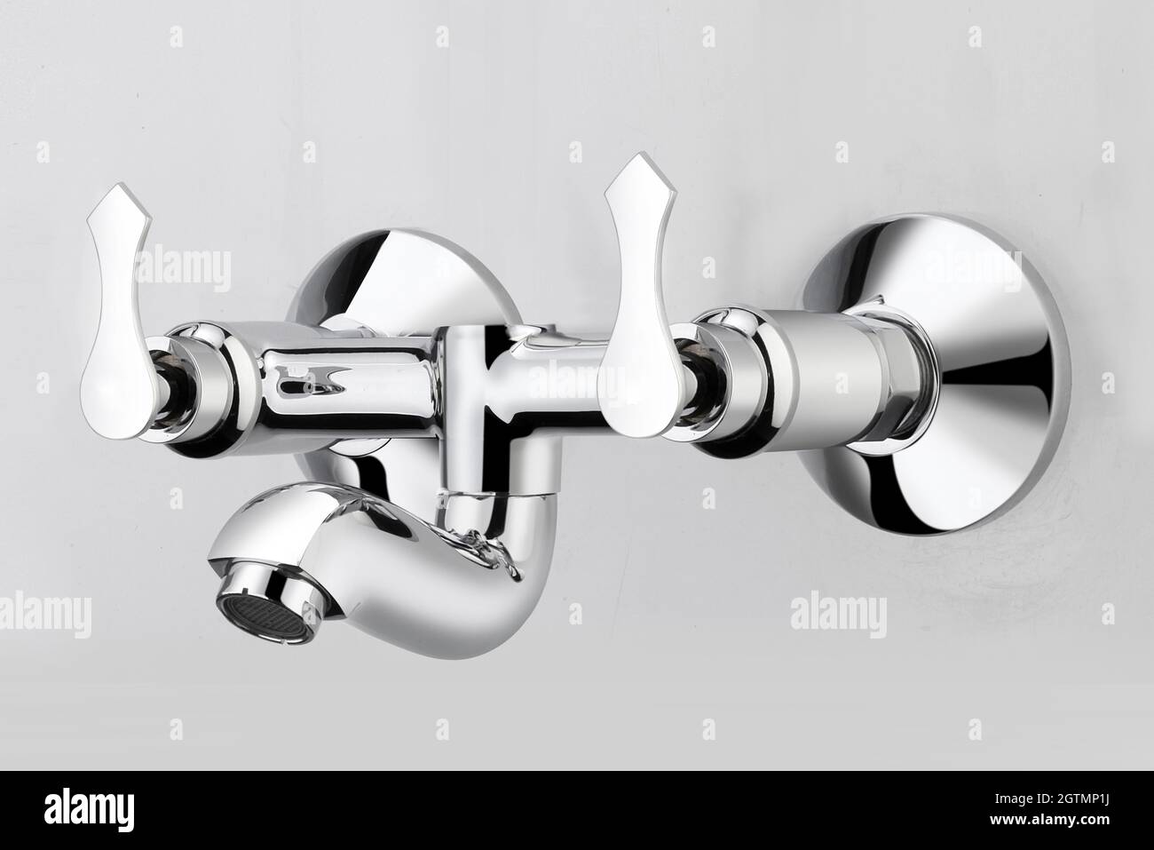 Modern stainless steel water tap. Isolated on white Grey background ...