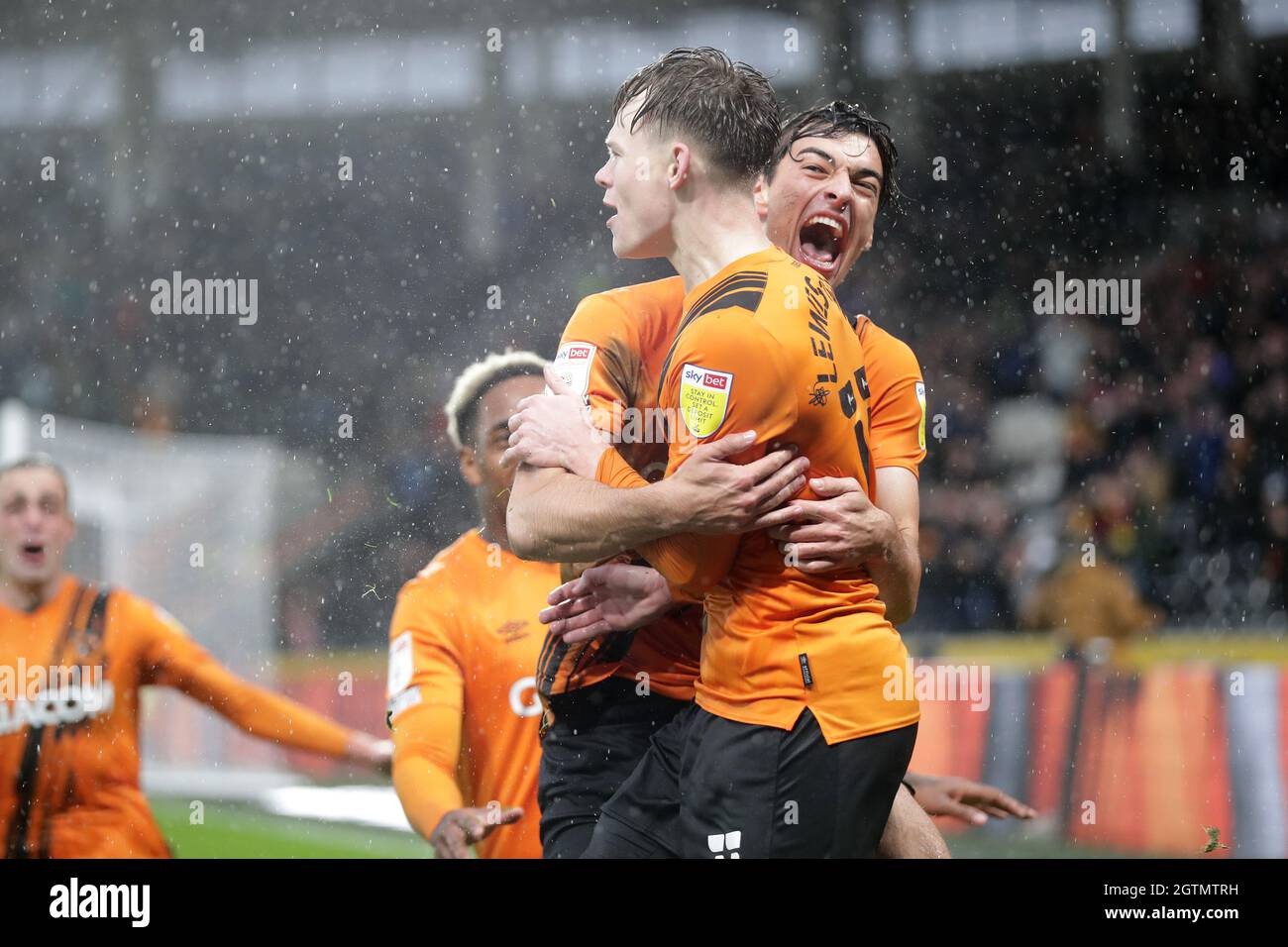 Hull City's Jacob Greaves and Keane Lewis-Potter (centre right ...