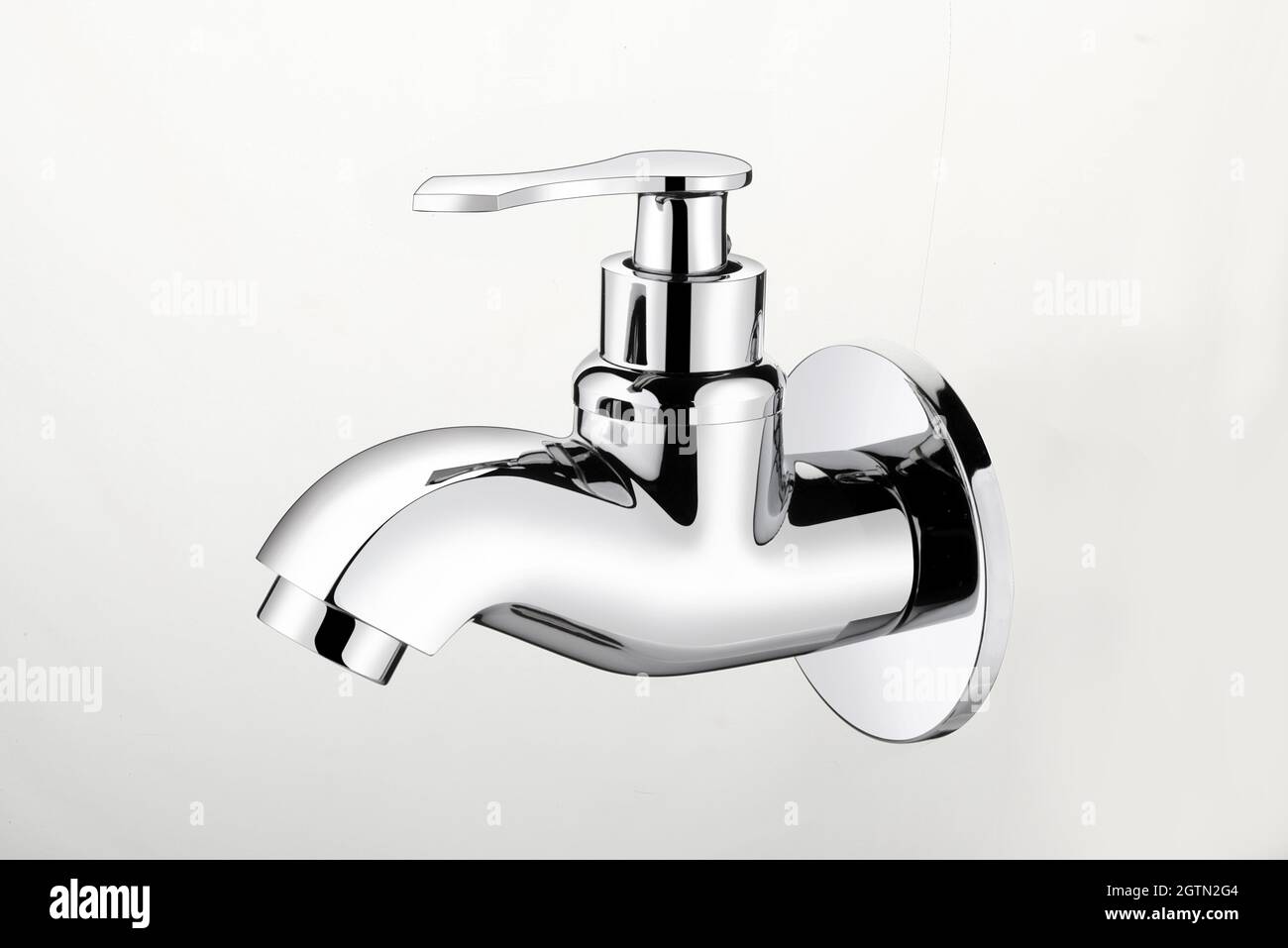 Modern stainless steel water tap. Isolated on white Grey background ...