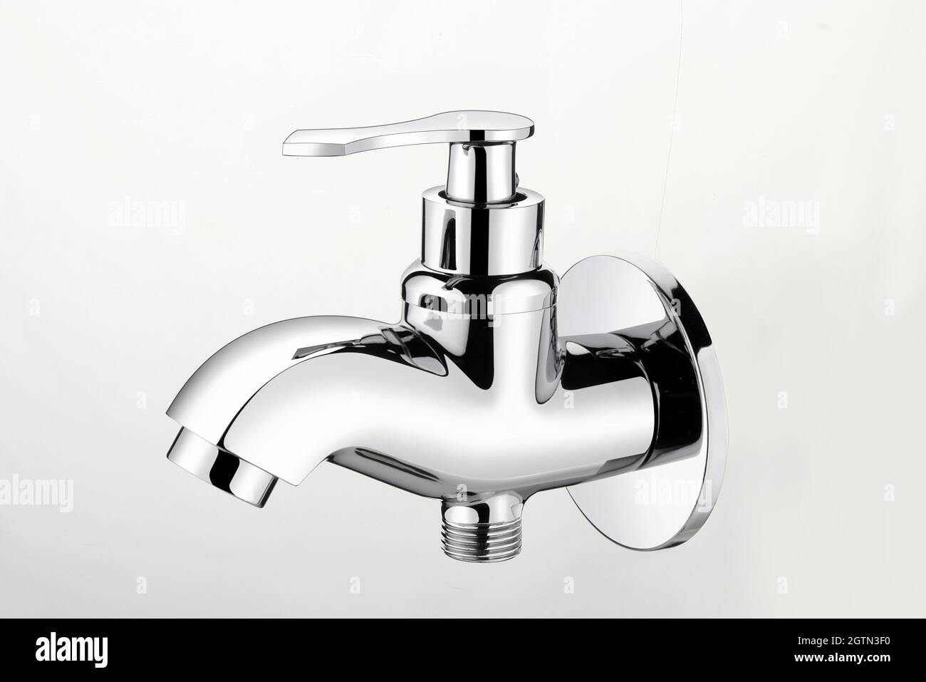 Modern stainless steel water tap. Isolated on white Grey background ...