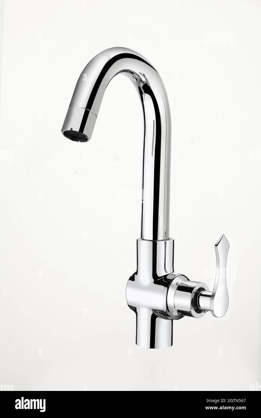 Modern stainless steel water tap. Isolated on white Grey background ...