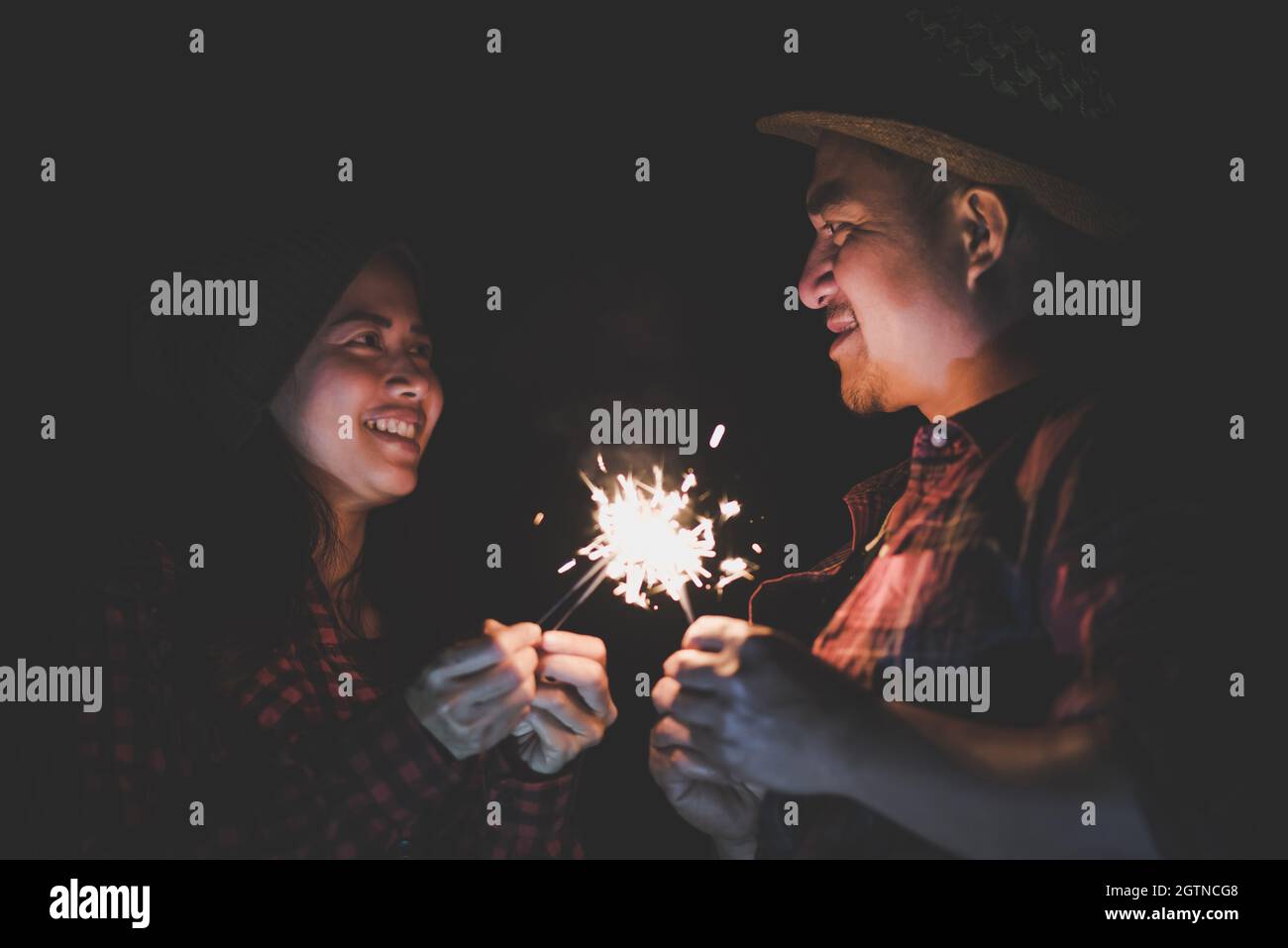 Young Man Looking Away At Night Stock Photo - Alamy
