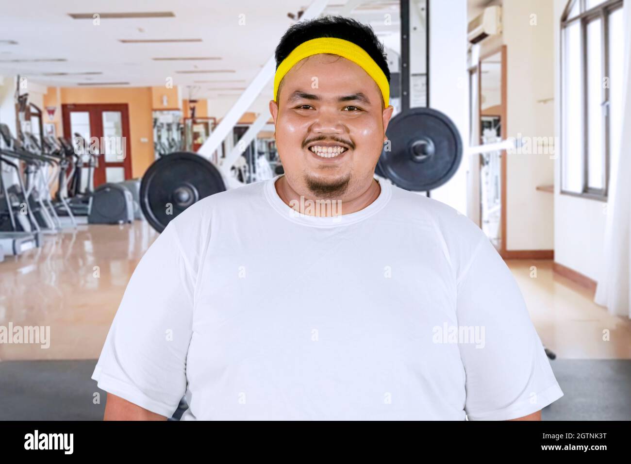 Fat men in gym hi-res stock photography and images - Alamy