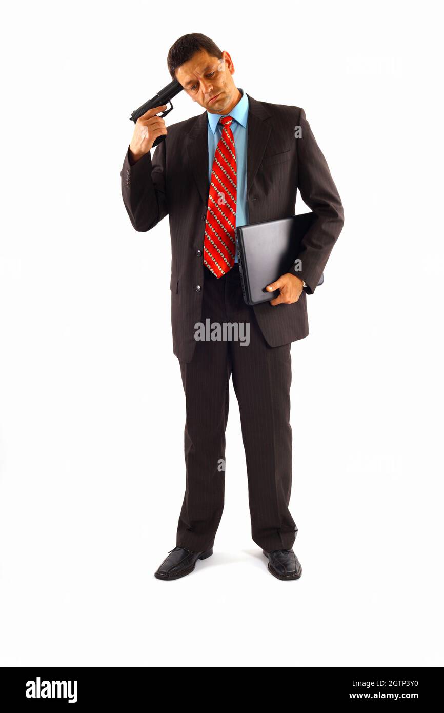 Businessman holding gun head hi-res stock photography and images - Alamy