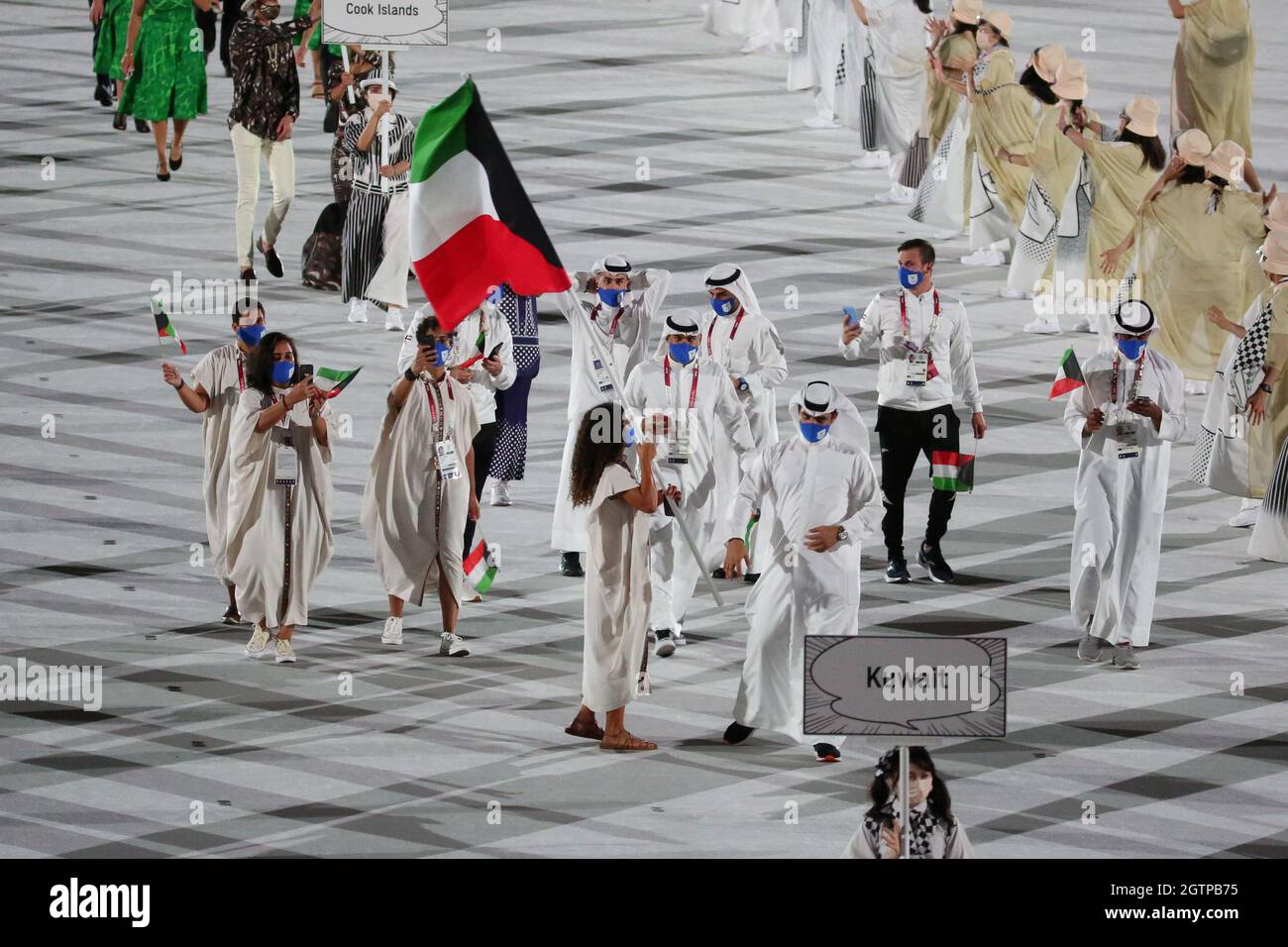 JULY 23rd, 2021 - TOKYO, JAPAN: Kuwait's flag bearers Lara Dashti and ...