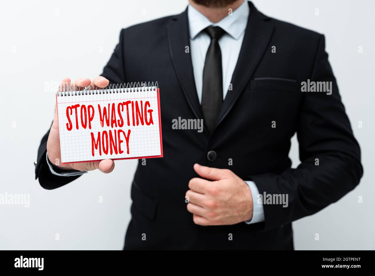 Conceptual display Stop Wasting Money. Business concept advicing person ...
