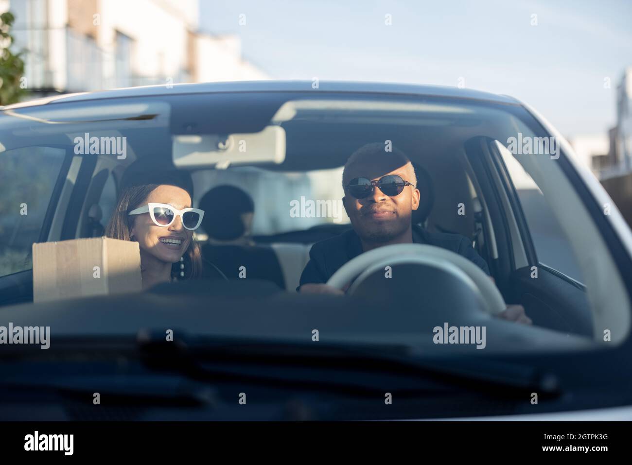 Family riding in car together hi-res stock photography and images - Alamy