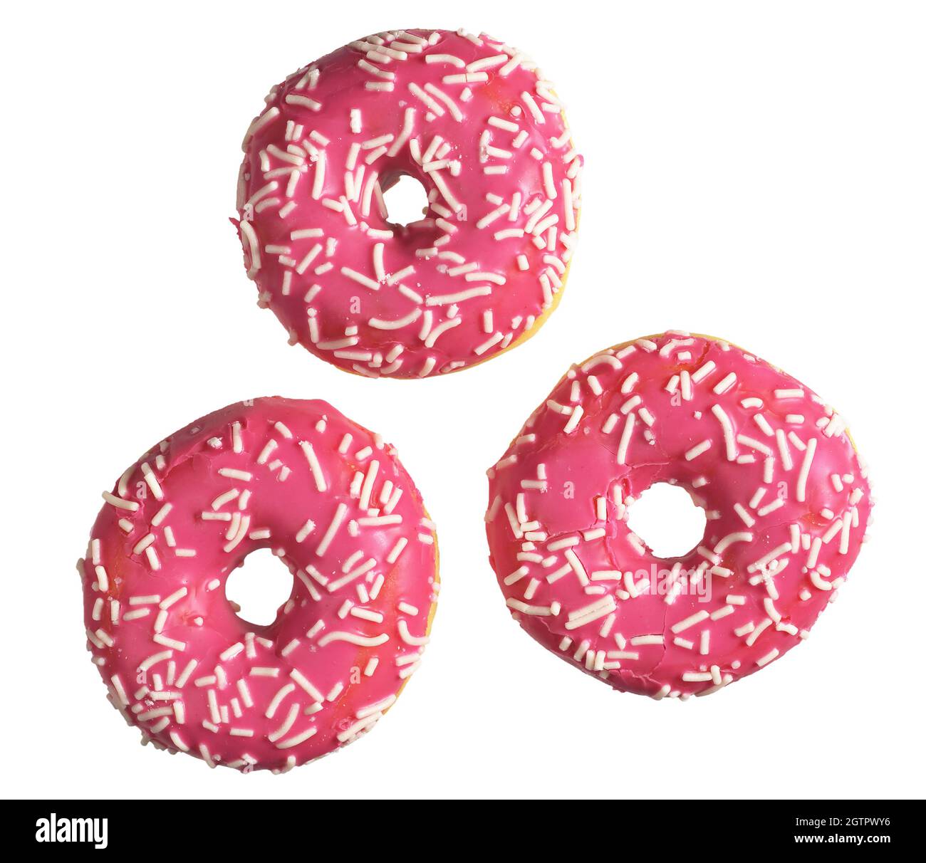 Three small glazed pink donuts with sprinkles isolated on white ...