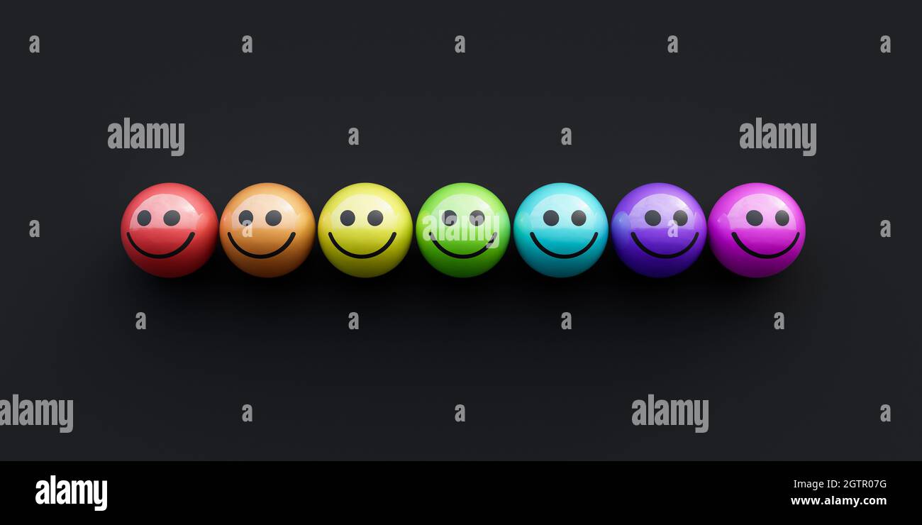 Rainbow colored balls with smiling faces lined up in row. Creative ...