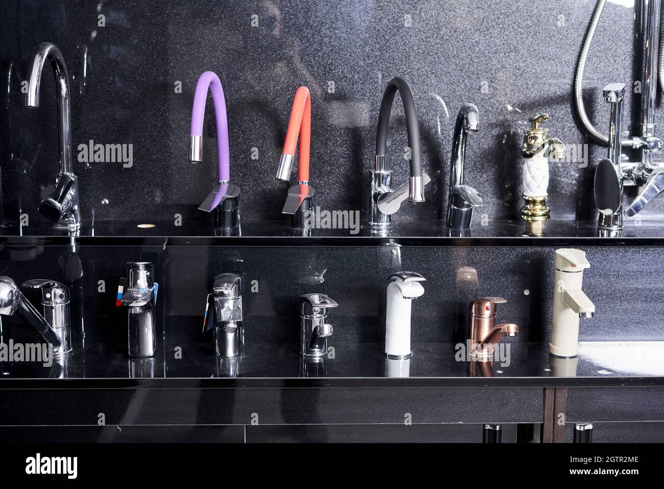 Different water pipes in a plumbing store Stock Photo - Alamy