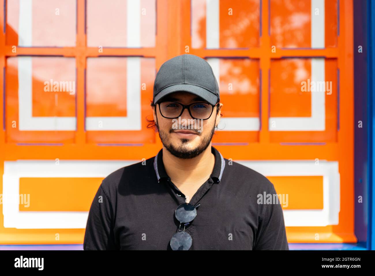 Man wearing red cap and red sunglasses hi-res stock photography and ...