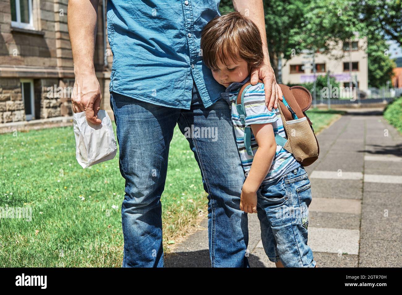 Father boy shy leg hi-res stock photography and images - Alamy