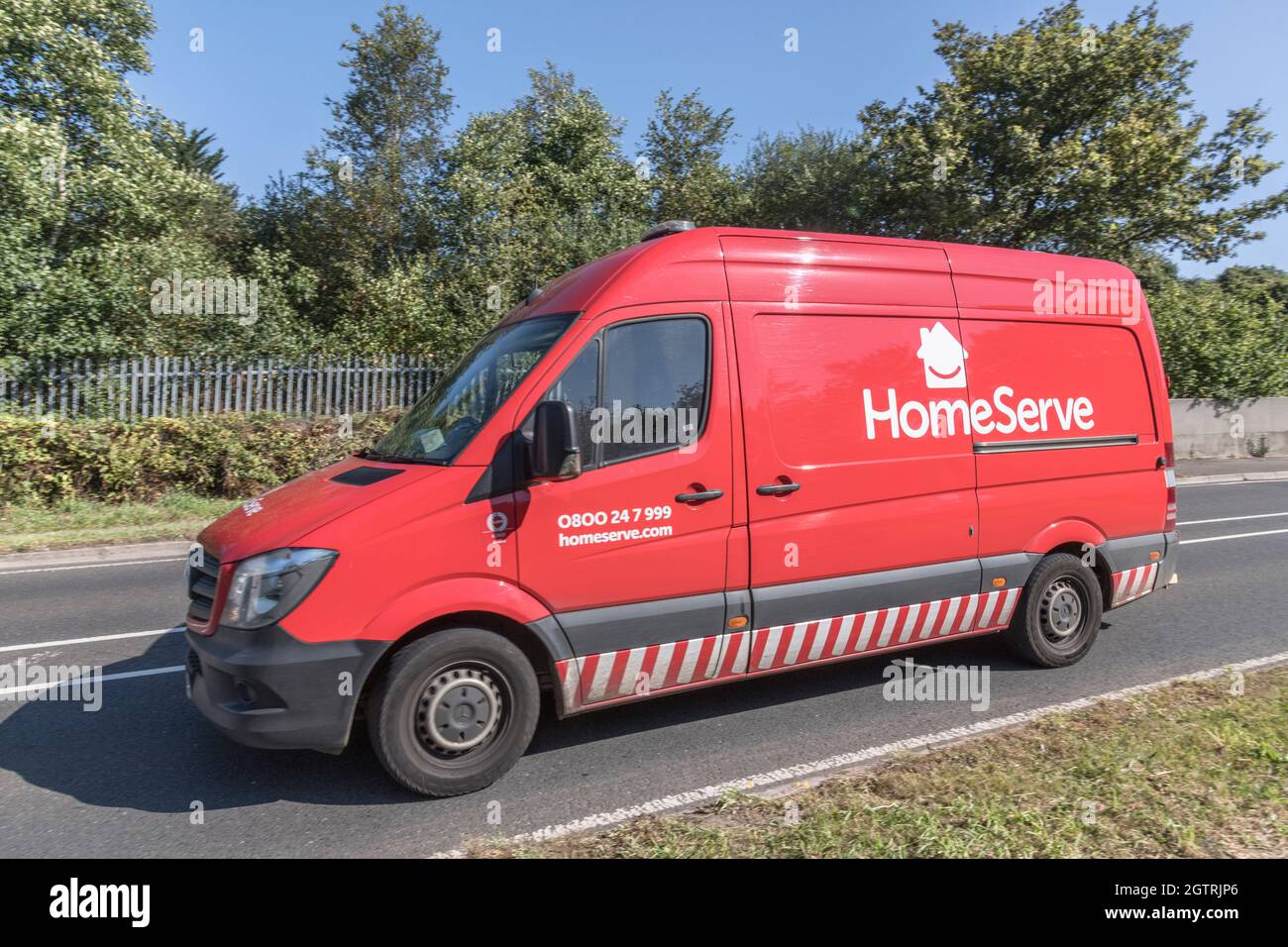 Red van travelling downhill hi-res stock photography and images - Alamy
