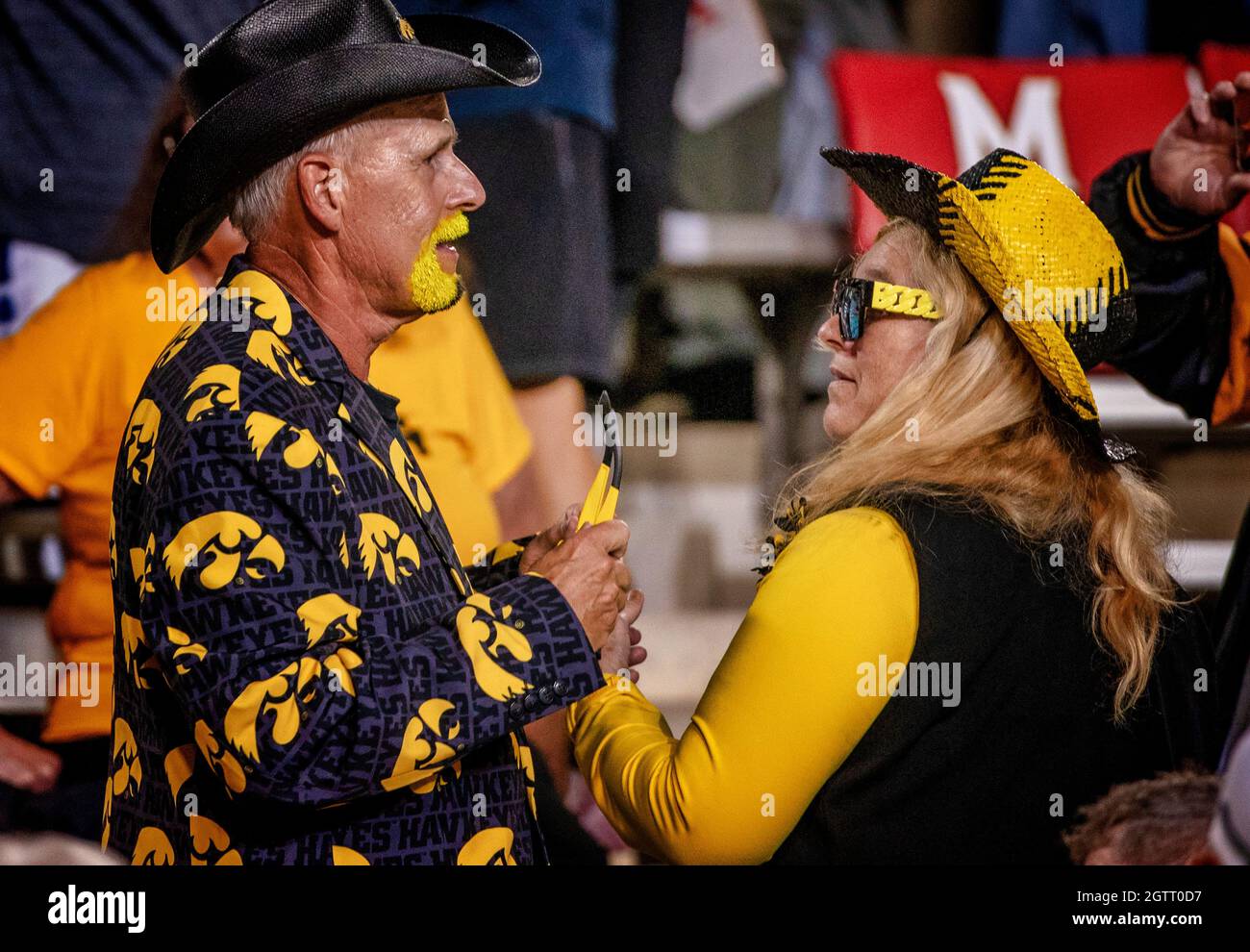 Fans of the Iowa Hawkeyes college football team Stock Photo - Alamy