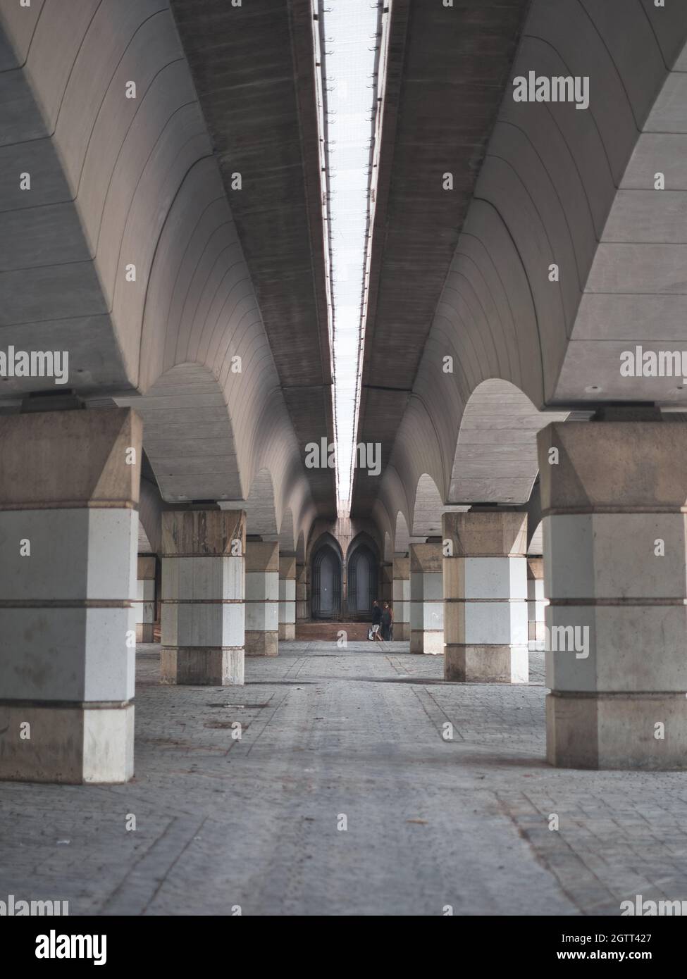 Vertical shot of a place with arches and columns Stock Photo - Alamy