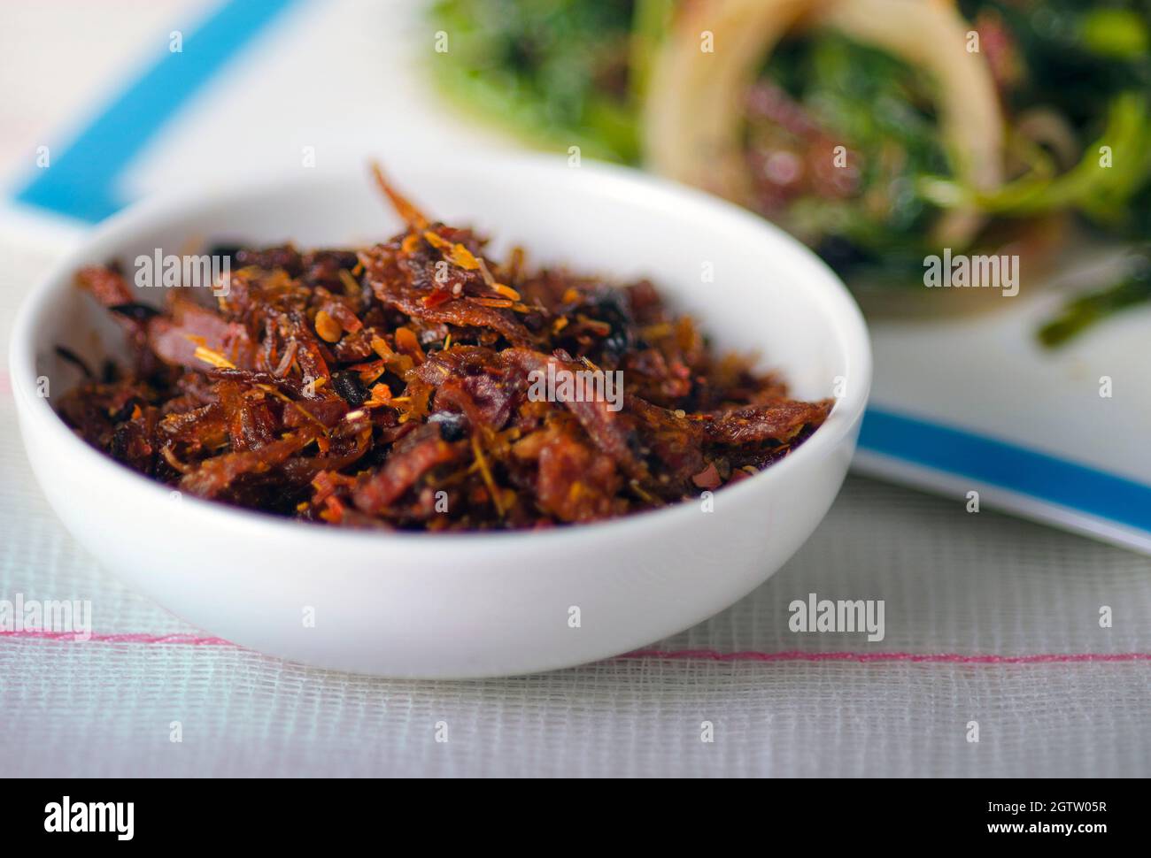 Close up. Appetizing Spicy Maldives fish dish - (dried fish) with leafy ...