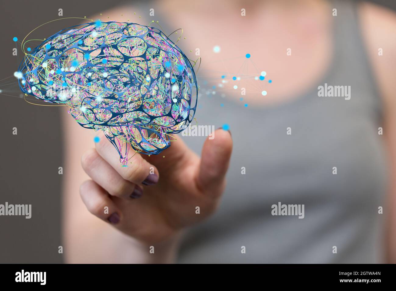 Person presenting the virtual 3D rendered projection of the human brain ...