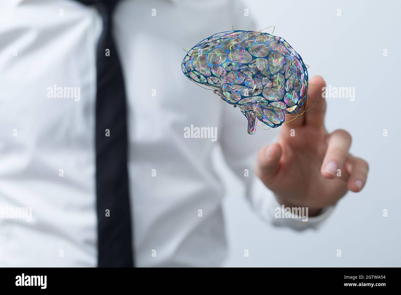 Person presenting the virtual 3D rendered projection of the human brain ...