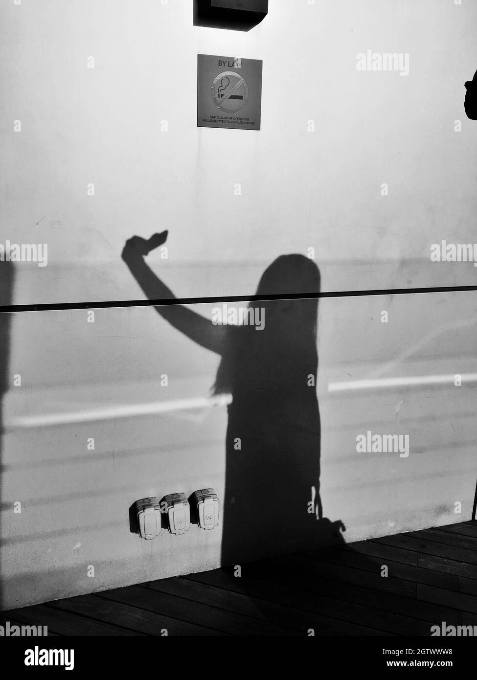 Shadow Of Girl Taking Selfie With Mobile Phone Stock Photo - Alamy