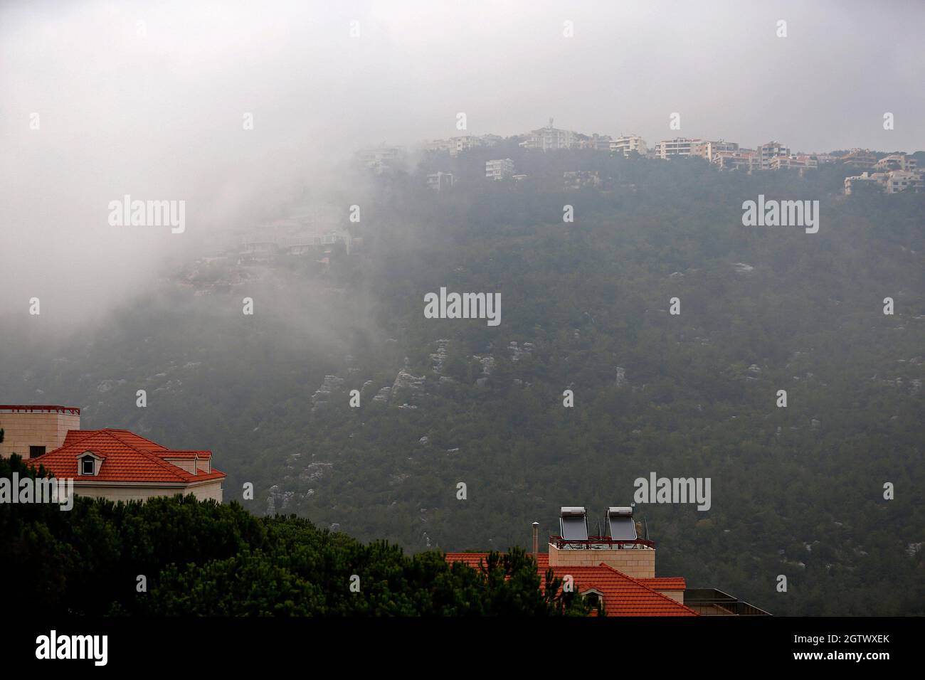 Dhour Choueir, Lebanon. 2nd Oct, 2021. Buildings are shrouded in fog in ...