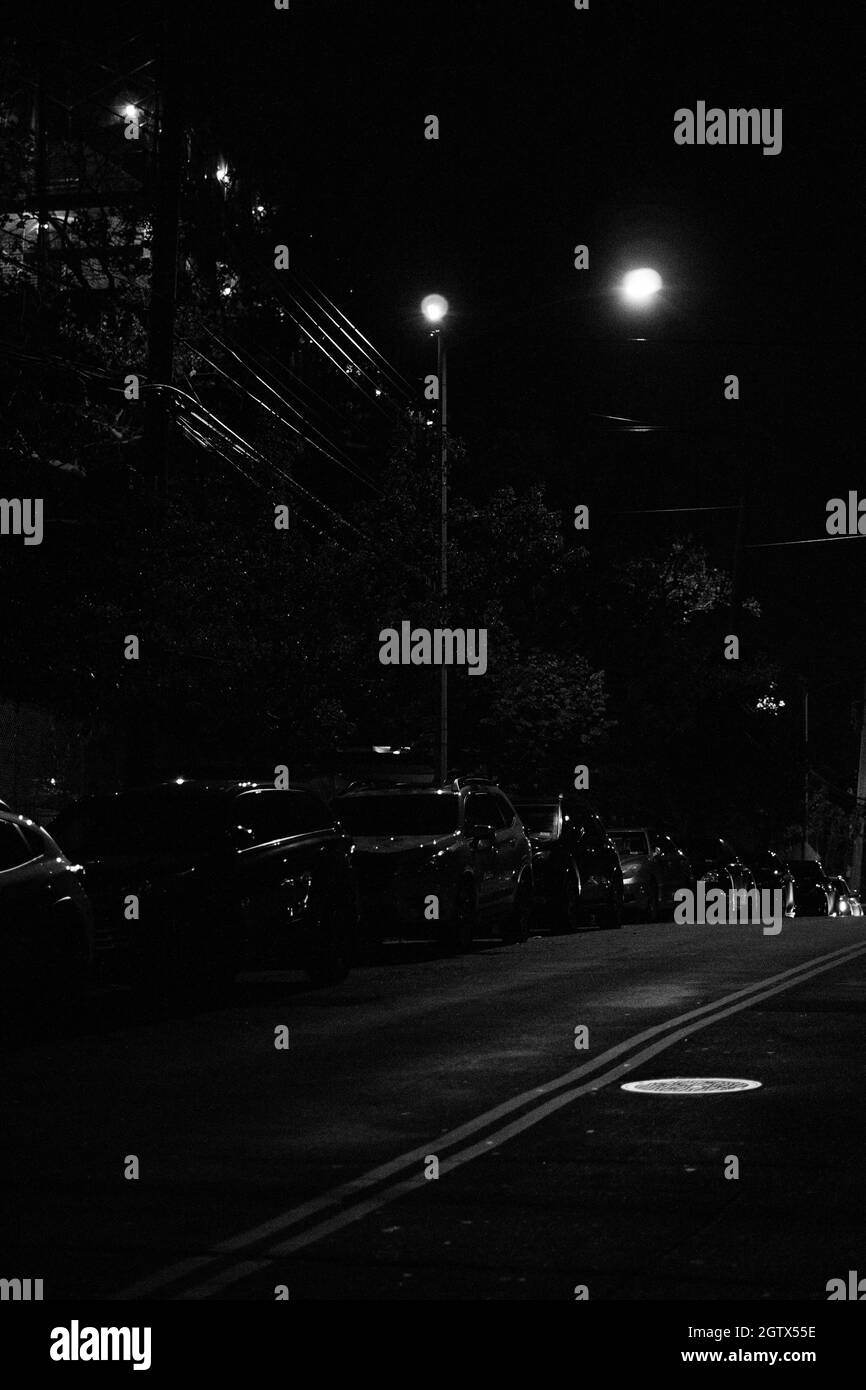 Parked cars night Black and White Stock Photos & Images - Alamy