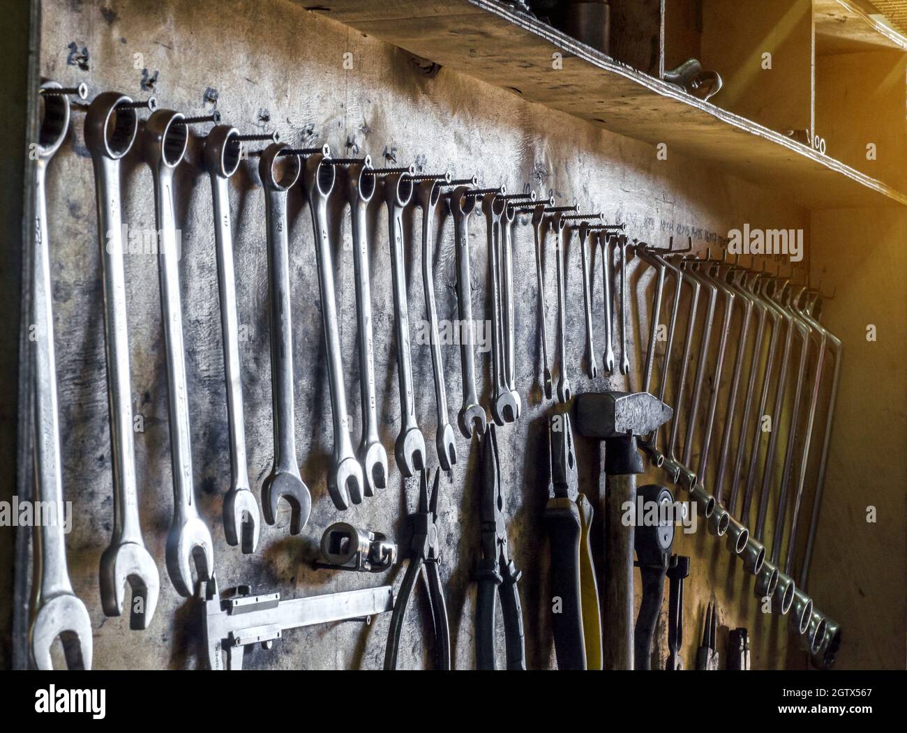 Hanging wrenches hi-res stock photography and images - Alamy