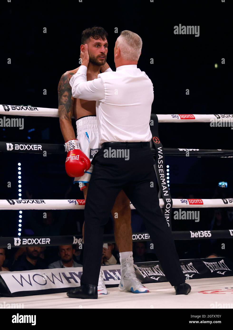 The referee checks on Liam Taylor in the EBU European Welter title ...