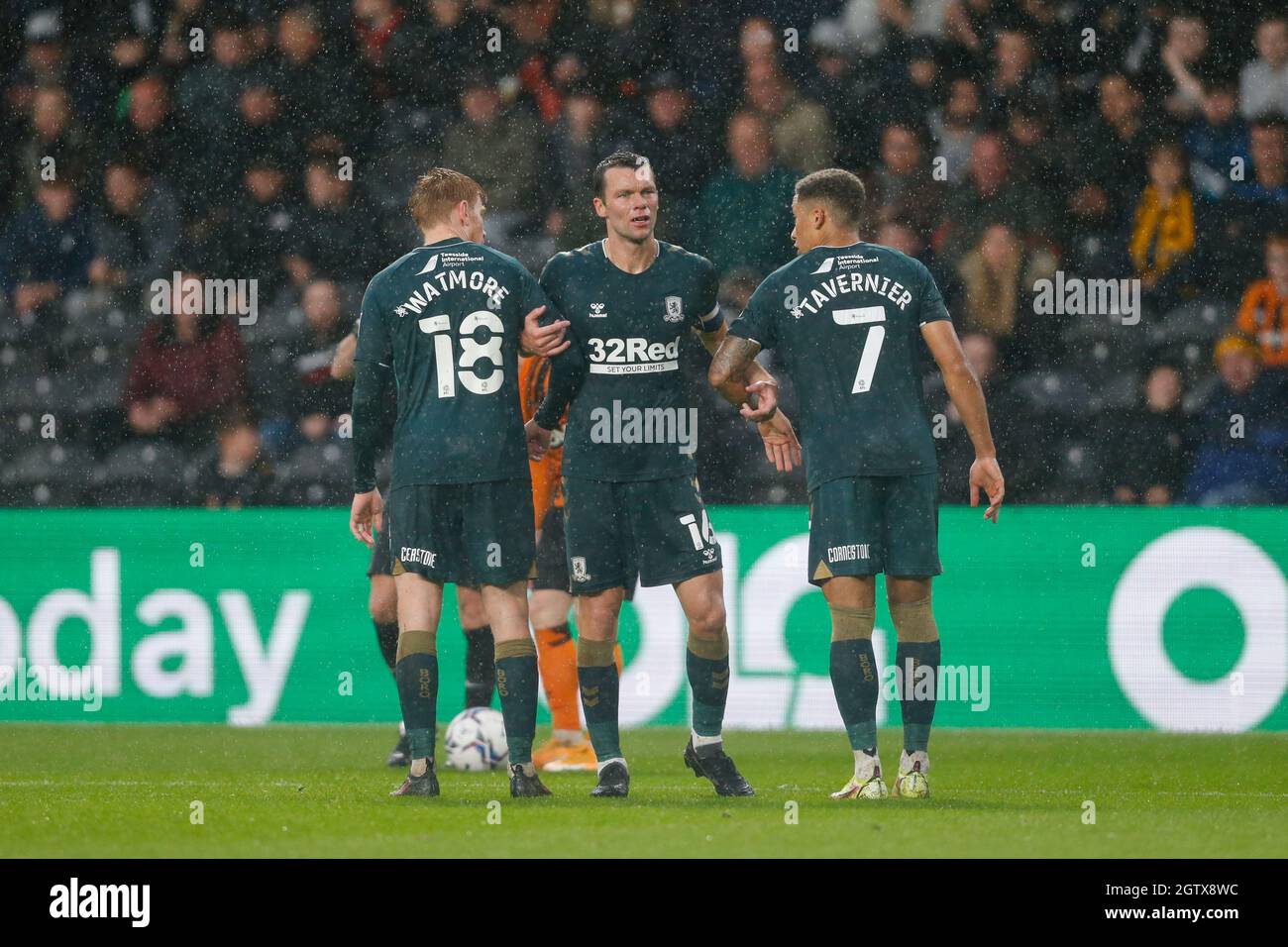 Jonathan Howson #16 of Middlesbrough sets up a wall with Duncan Watmore ...