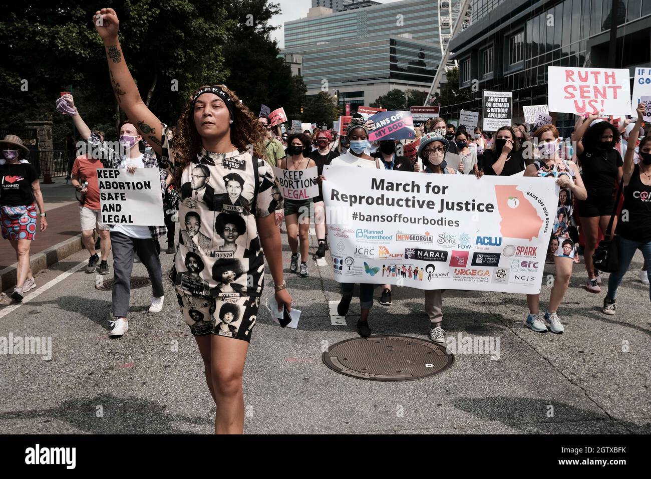 Atlanta, Georgia, USA. 2nd Oct, 2021. A group of protesters march ...