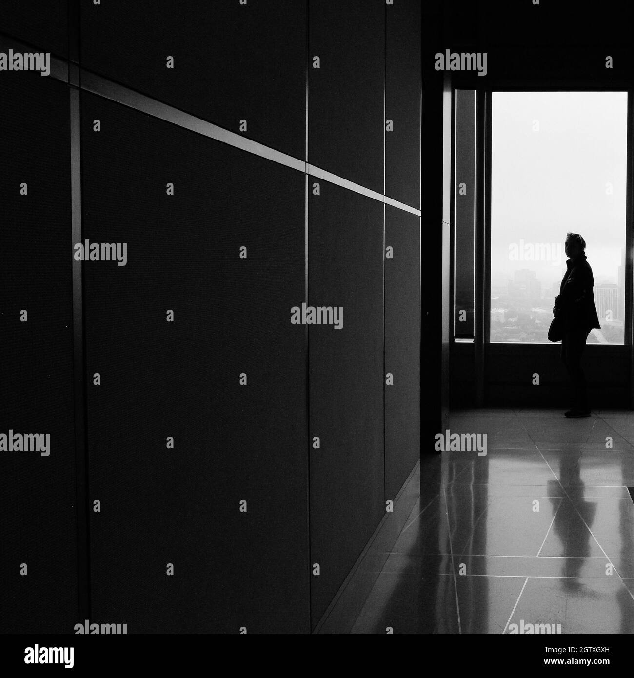 Man silhouette in window exterior hi-res stock photography and images ...