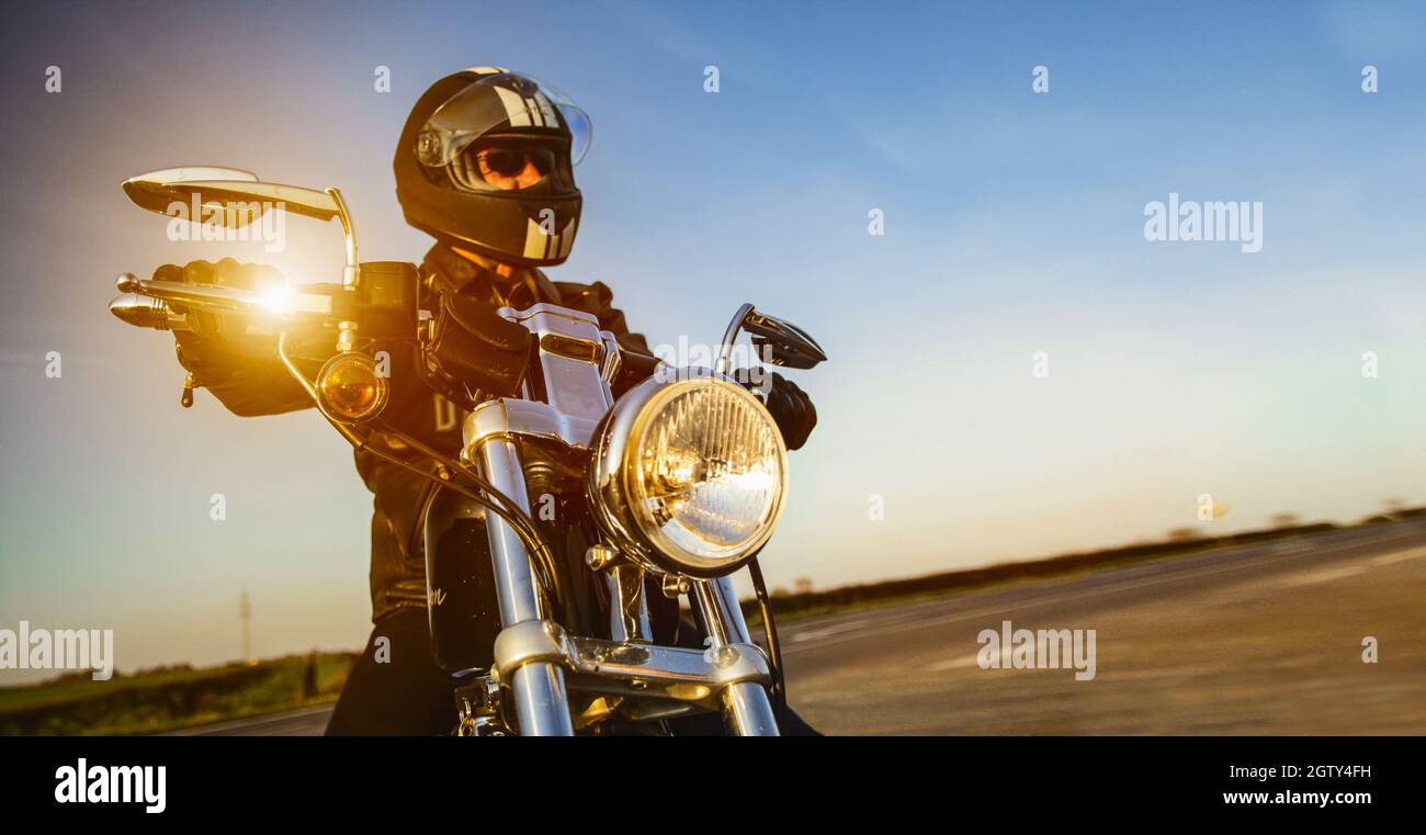Biker riding motorcycle low angle hi-res stock photography and images ...