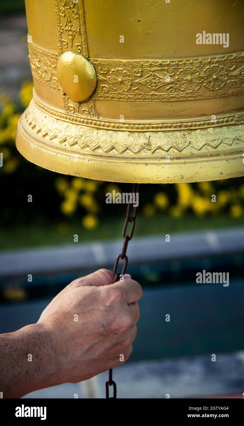 Hand bell chain hi-res stock photography and images - Alamy