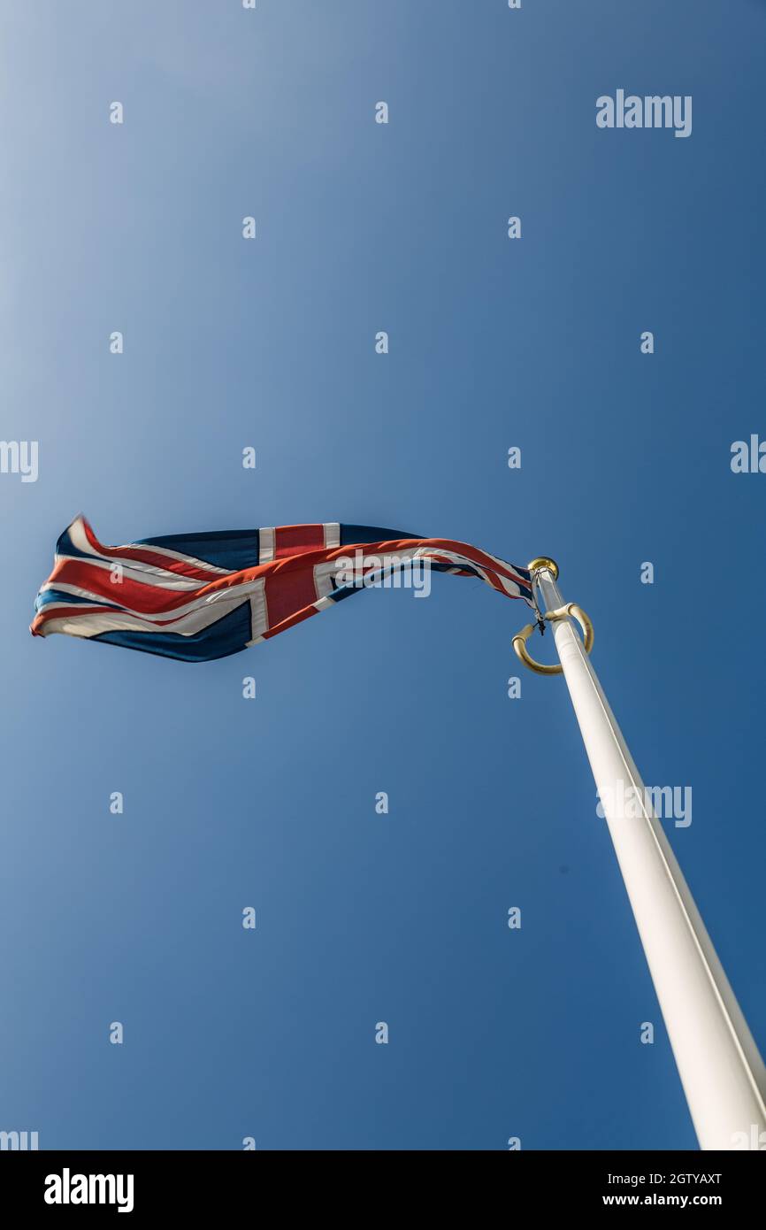 Hoisting british flag hi-res stock photography and images - Alamy