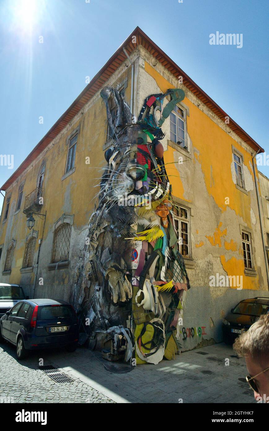 Wall art: Half Rabbit by Bordalo II is a street art installation in ...