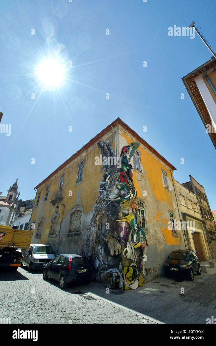 Wall art: Half Rabbit by Bordalo II is a street art installation in ...