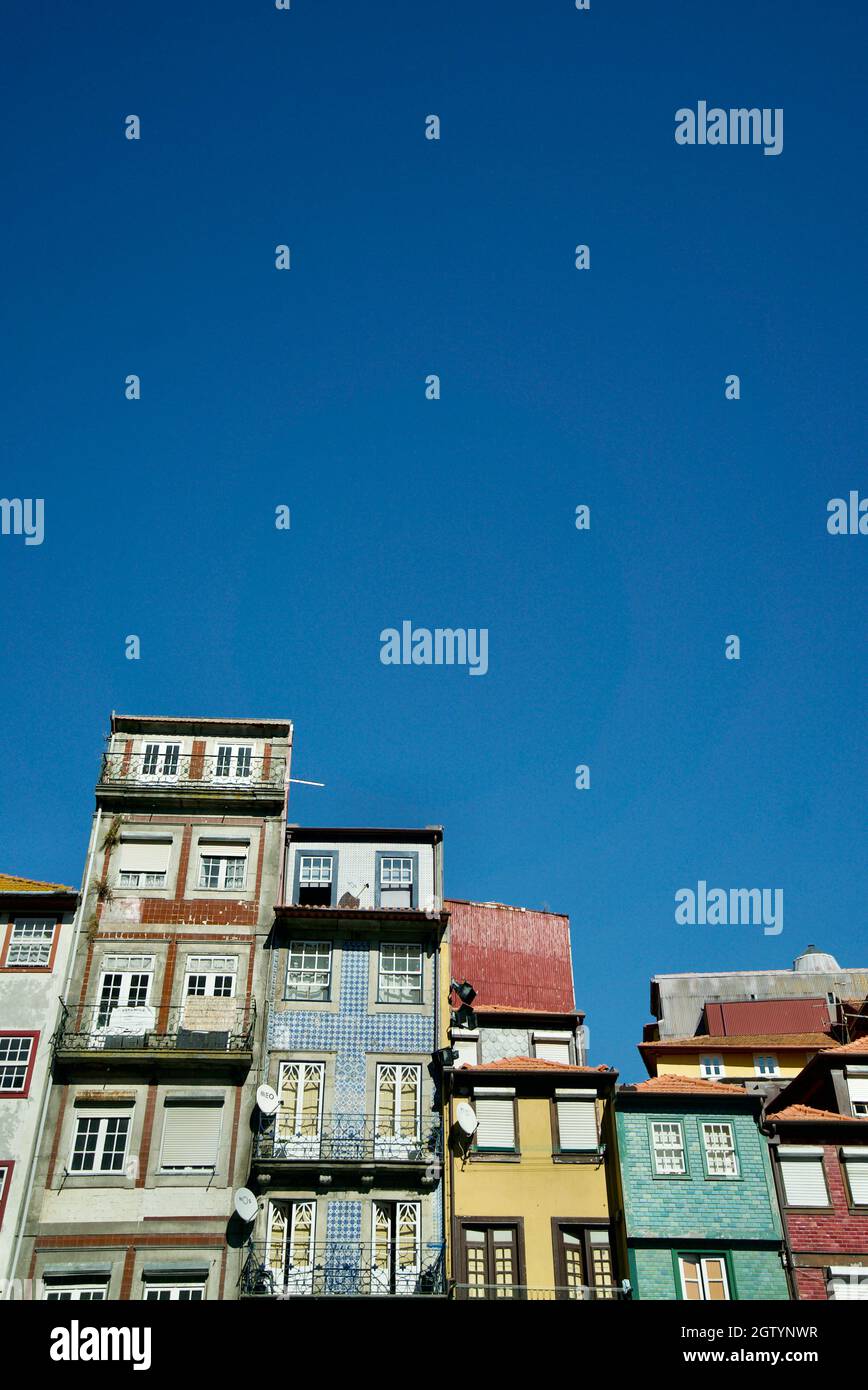 Colorful buildings in Porto, Portugal. Typical Portuguese houses on a ...