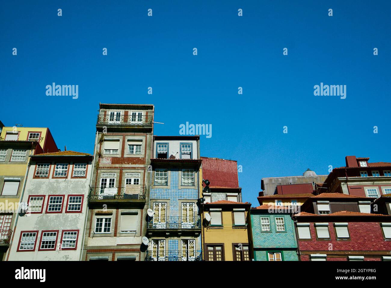 Colorful buildings in Porto, Portugal. Typical Portuguese houses on a ...